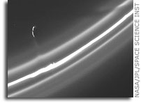 Small Moon (Prometheus?) Caught in the Act of Disturbing Saturn's F ...